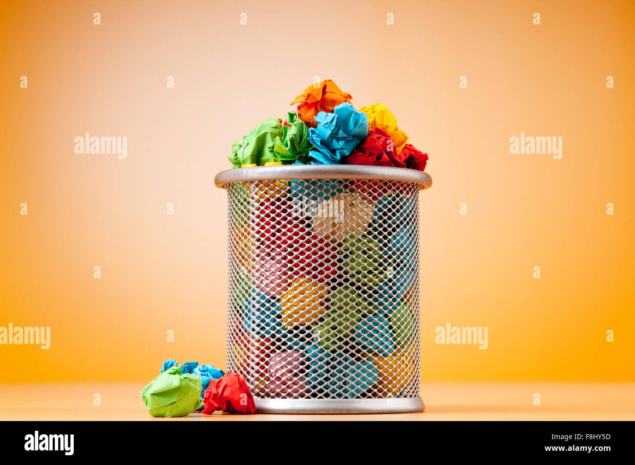 Garbage bin with paper waste isolated on white Stock Photo - Alamy