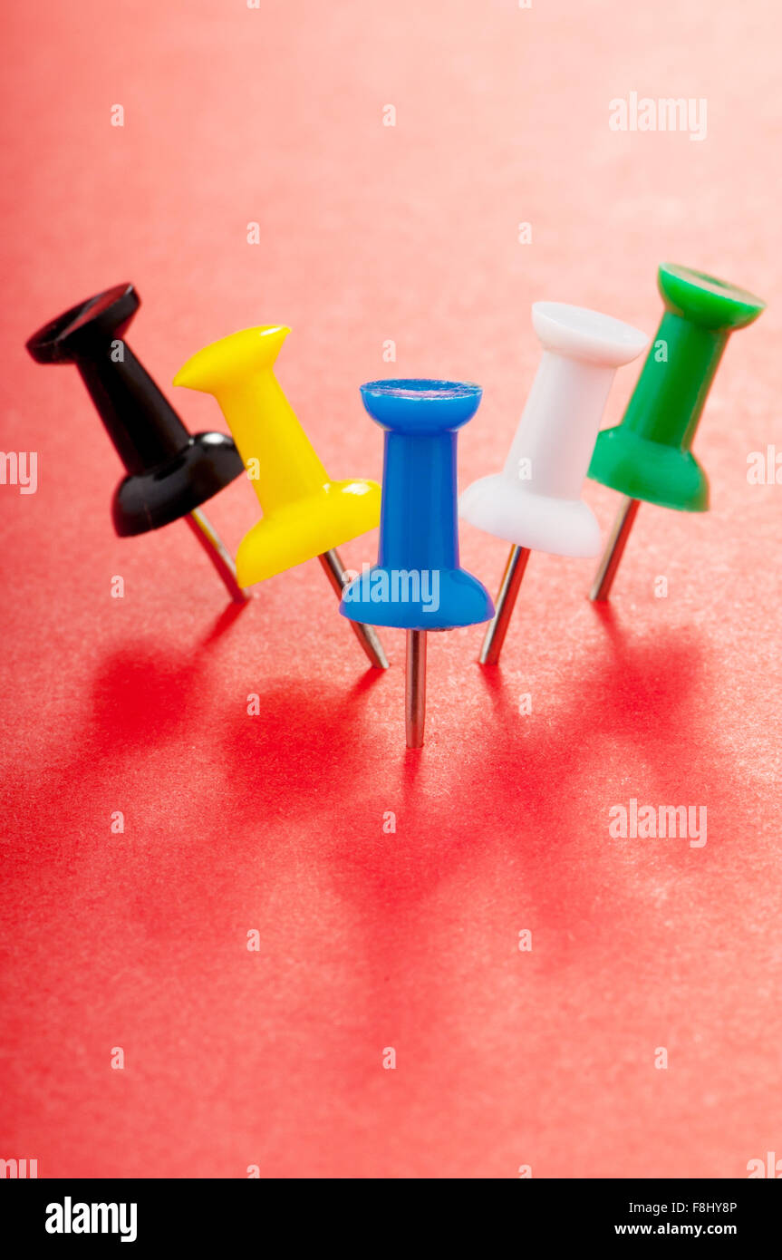 Office pins on the paper Stock Photo - Alamy