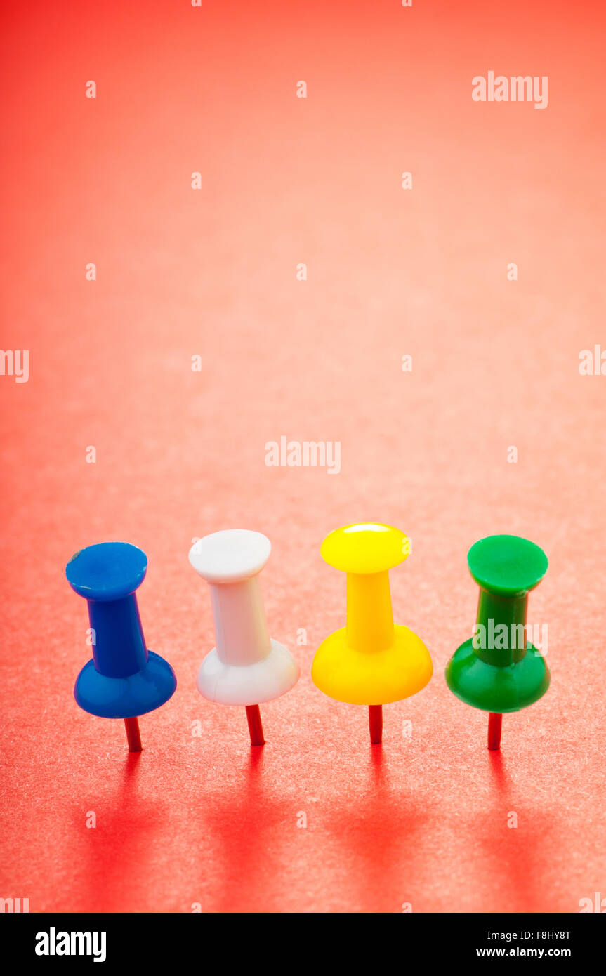 Office pins on the paper Stock Photo - Alamy
