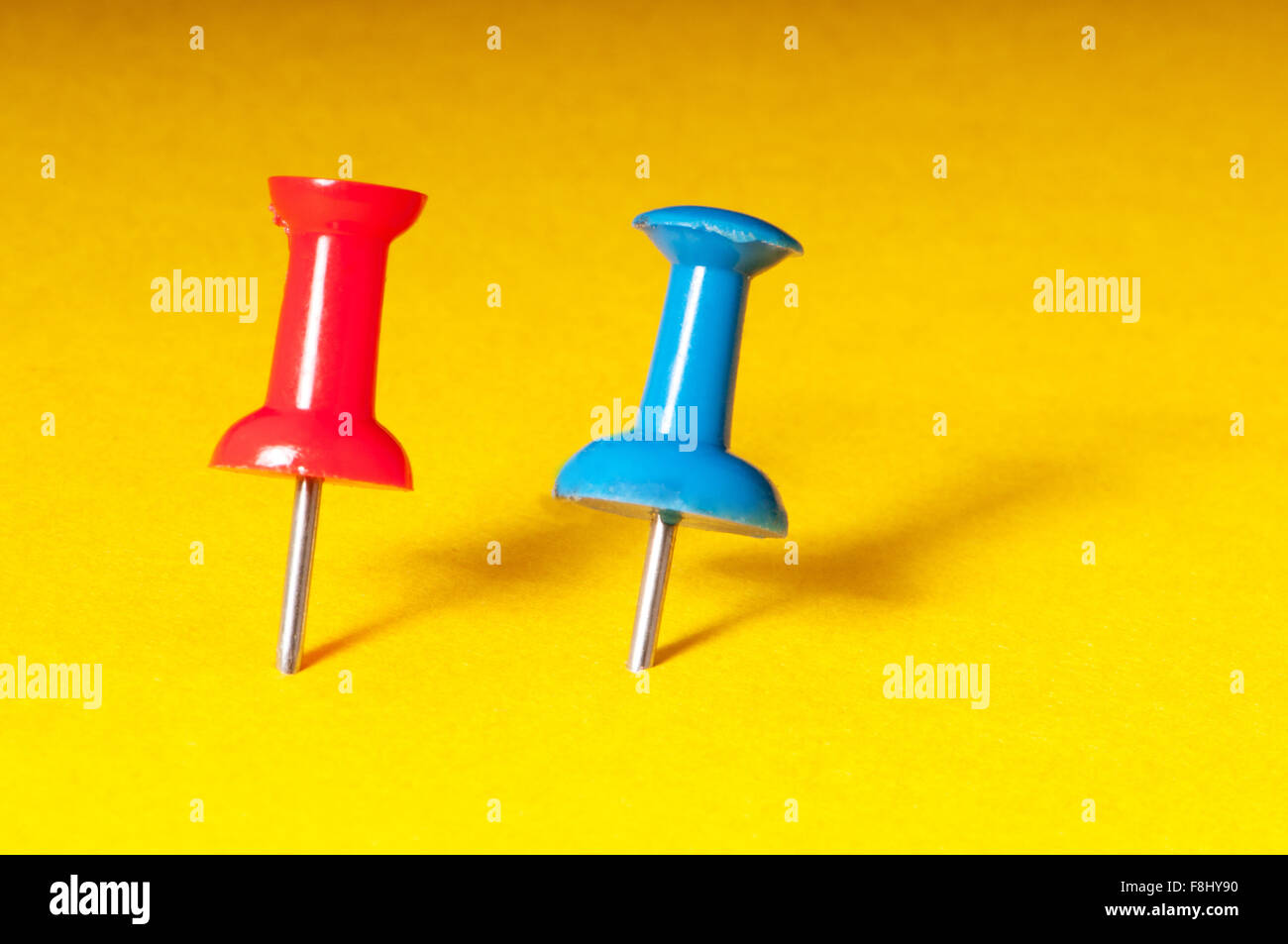 Office pins on the paper Stock Photo - Alamy