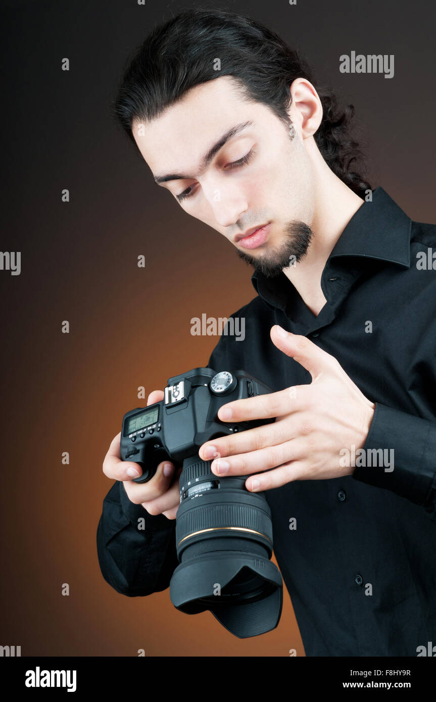 Photographer with the digital camera Stock Photo - Alamy