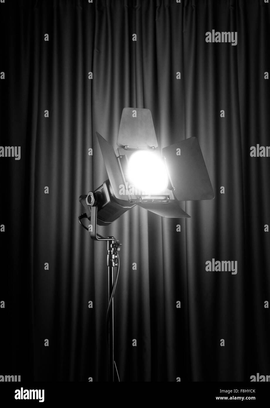 Curtains and projector lights wtih space for your text Stock Photo - Alamy