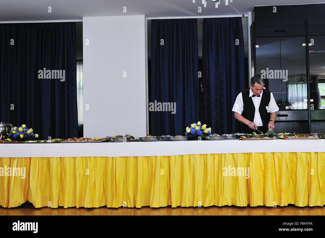 catering buffet food party preparation man Stock Photo - Alamy