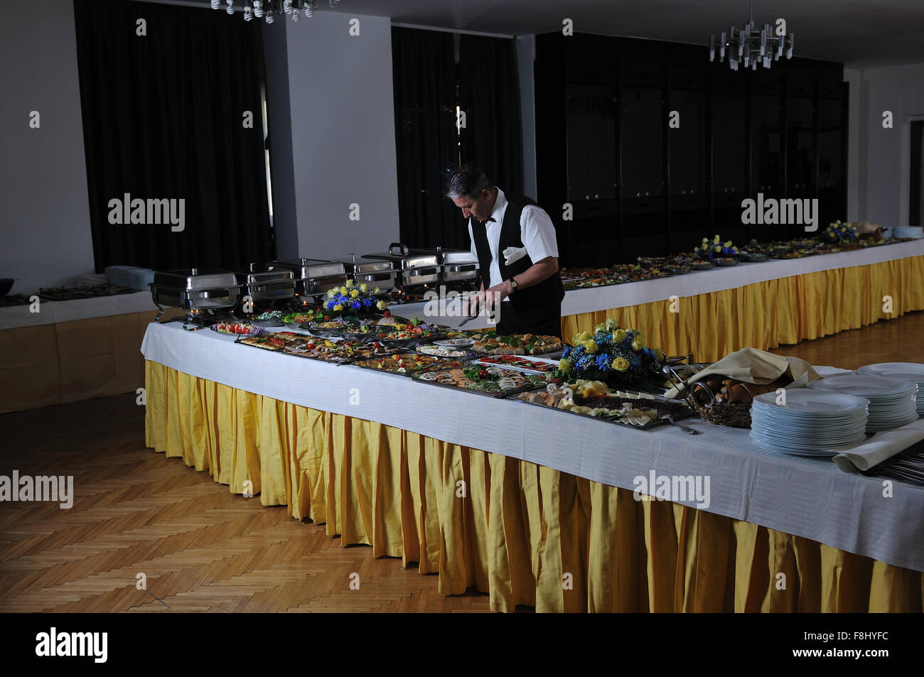catering buffet food party preparation man Stock Photo - Alamy