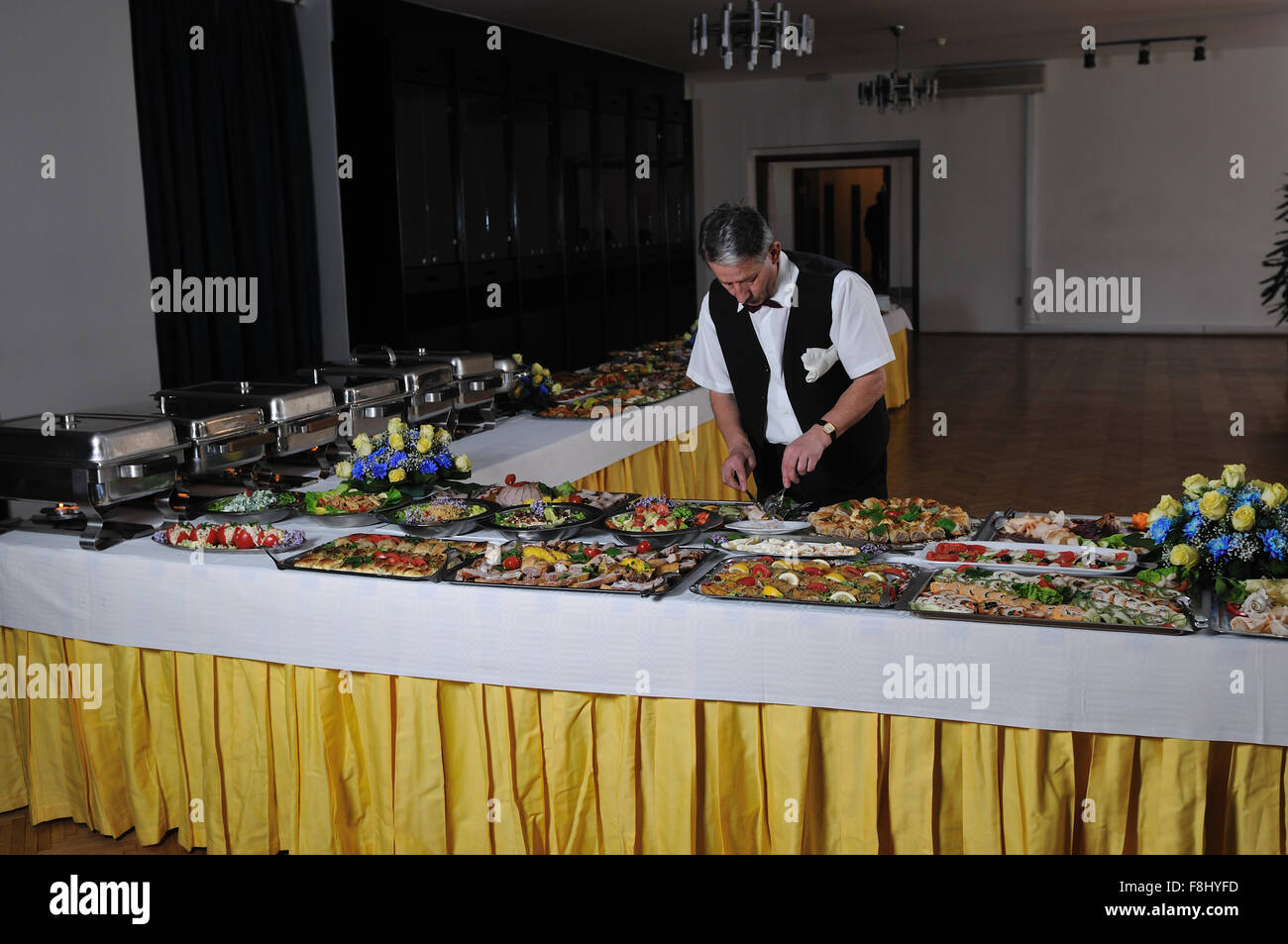 catering buffet food party preparation man Stock Photo - Alamy