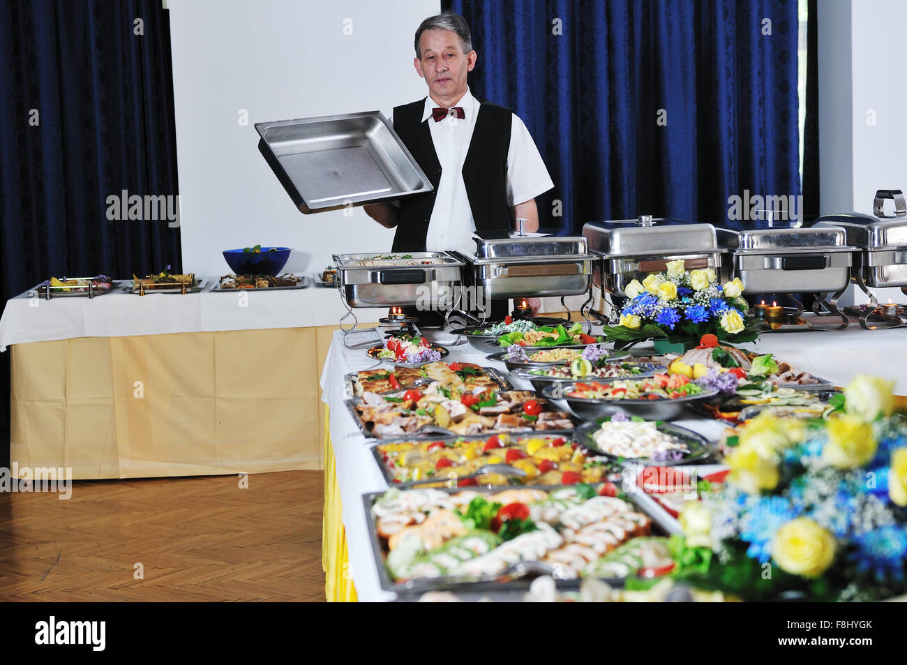 catering buffet food party preparation man Stock Photo - Alamy