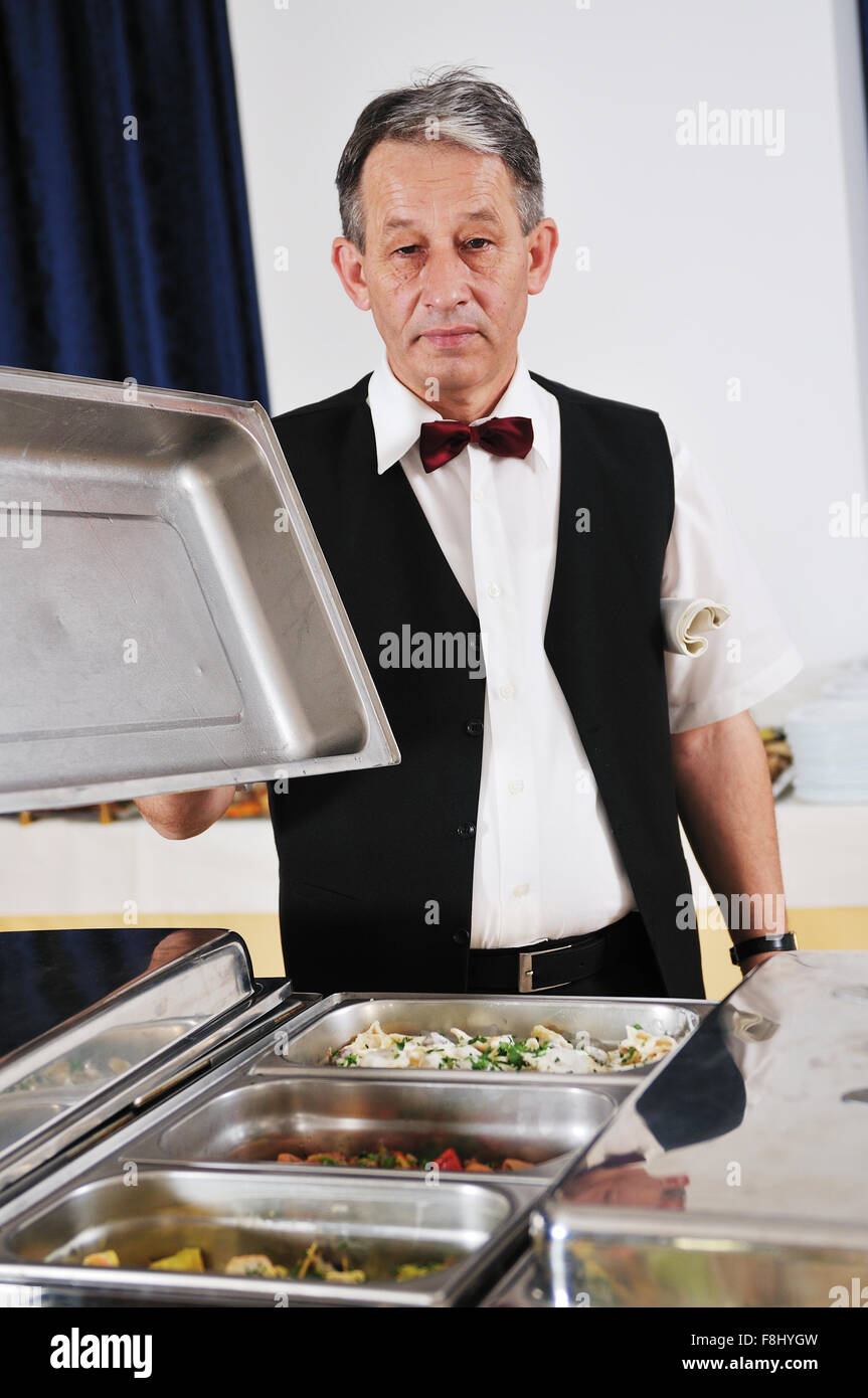 catering buffet food party preparation man Stock Photo - Alamy