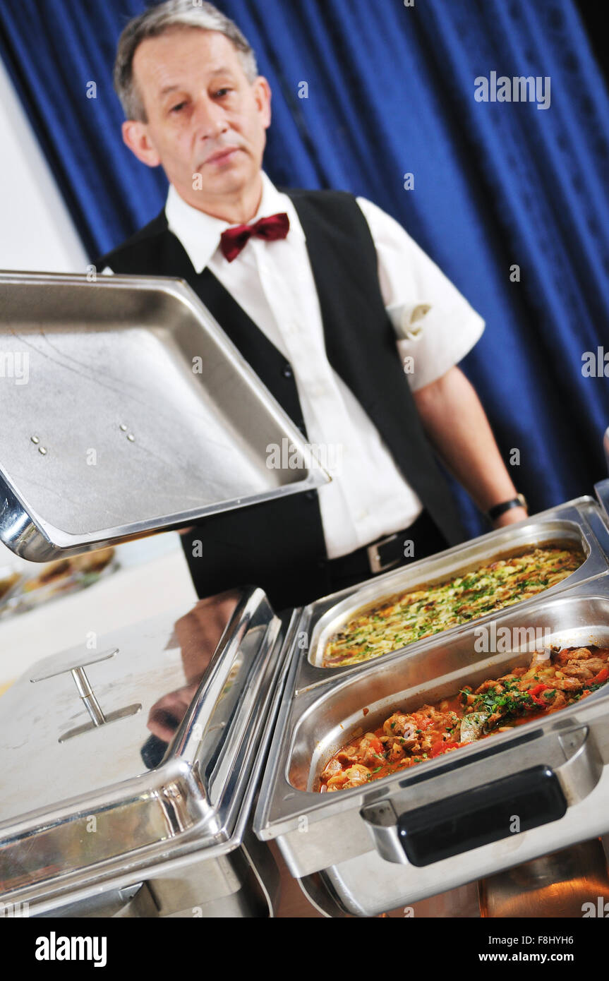 catering buffet food party preparation man Stock Photo - Alamy