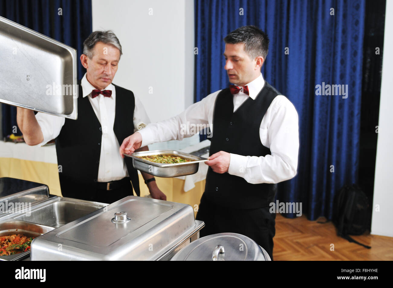 catering buffet food party preparation man Stock Photo - Alamy