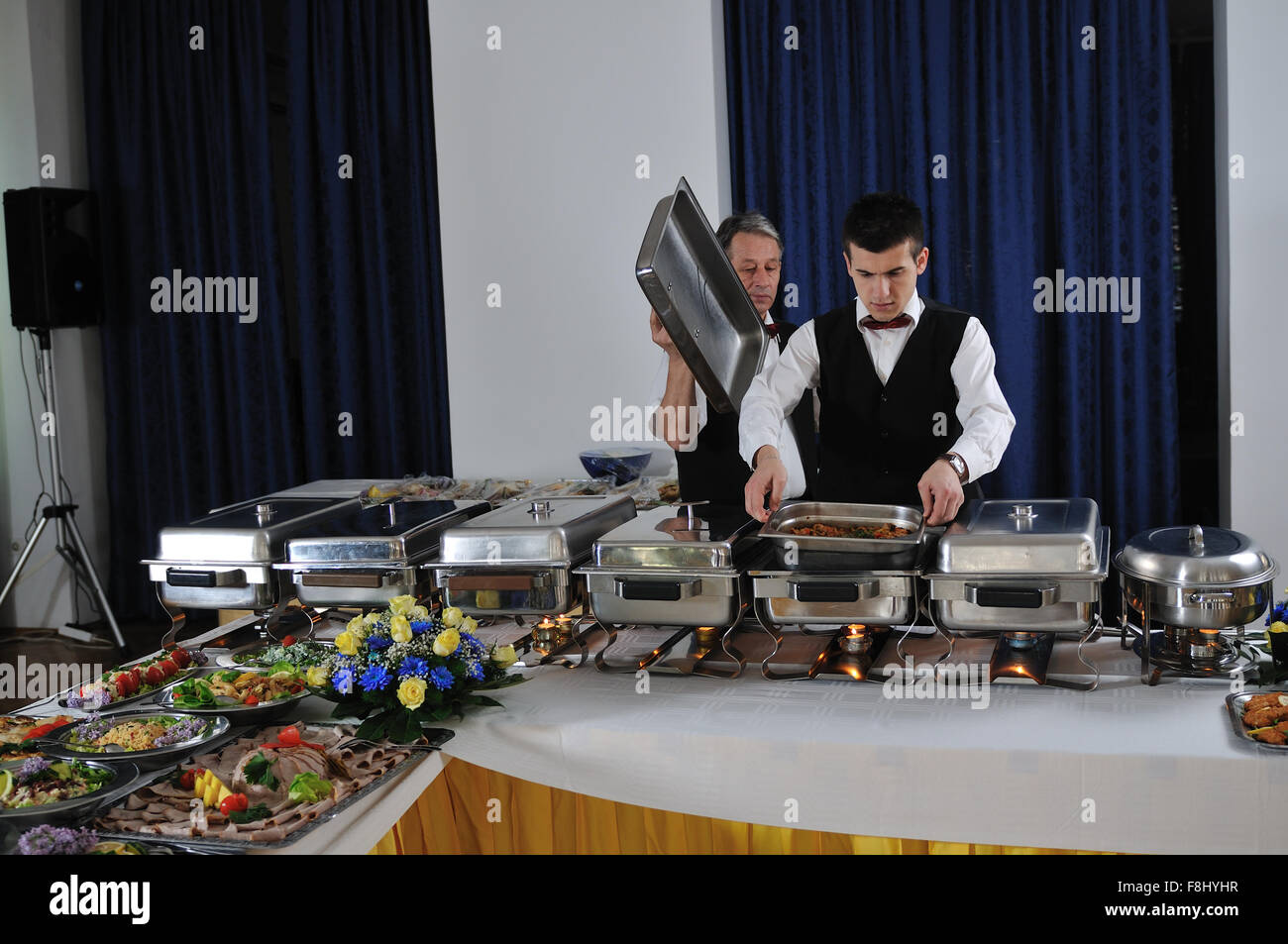 catering buffet food party preparation man Stock Photo - Alamy