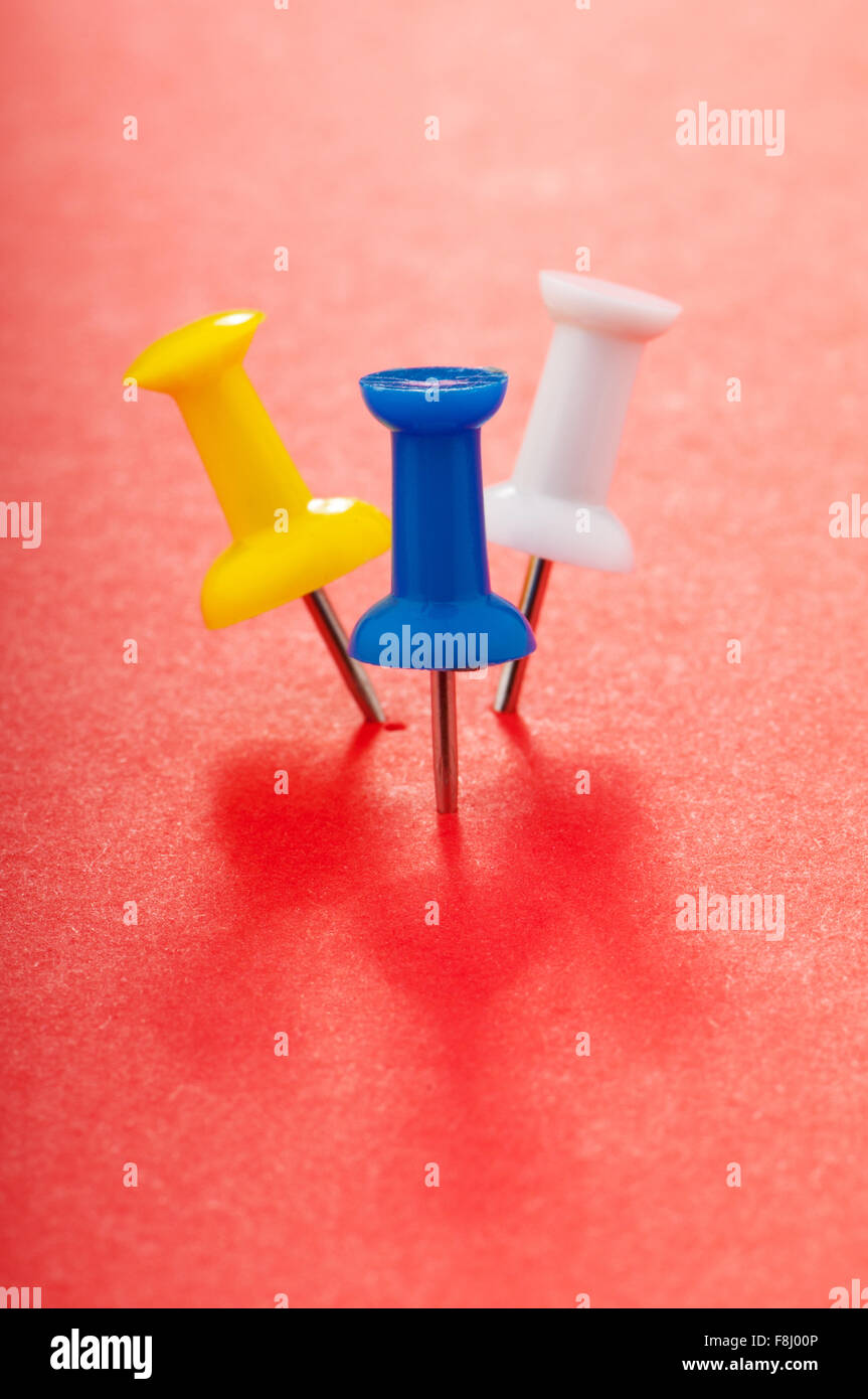 Office pins on the paper Stock Photo - Alamy