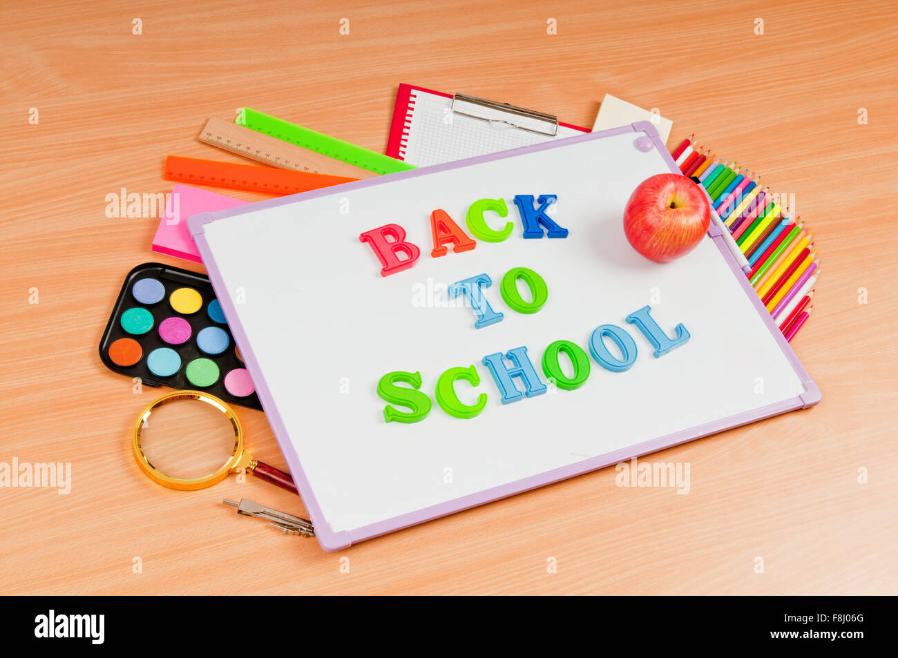 School items on the desk Stock Photo - Alamy