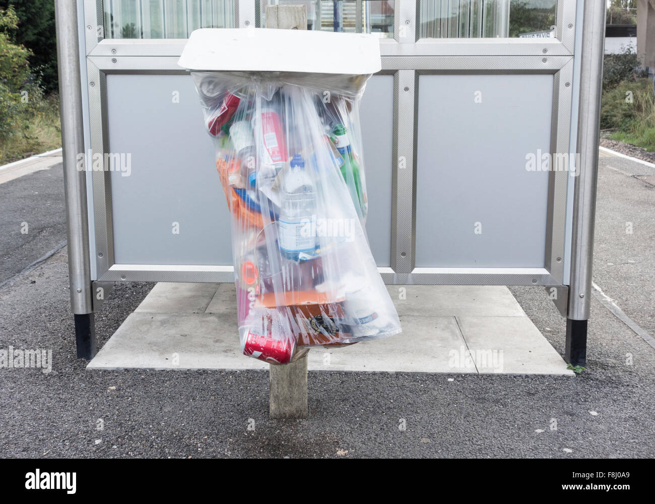 Plastic litter bin on railway station platform. England, UK Stock Photo ...