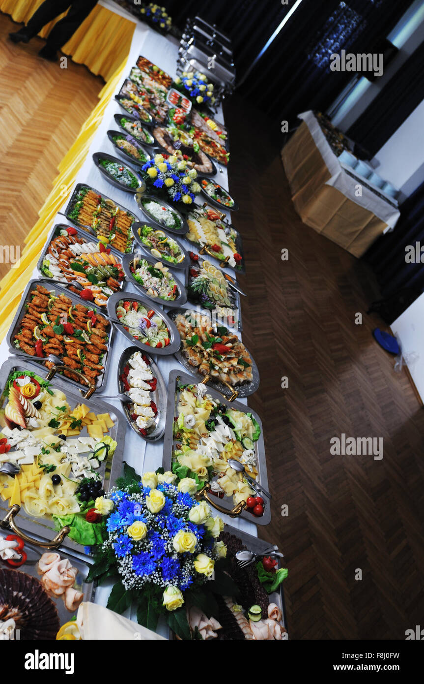 buffet catering food arangement on table Stock Photo - Alamy