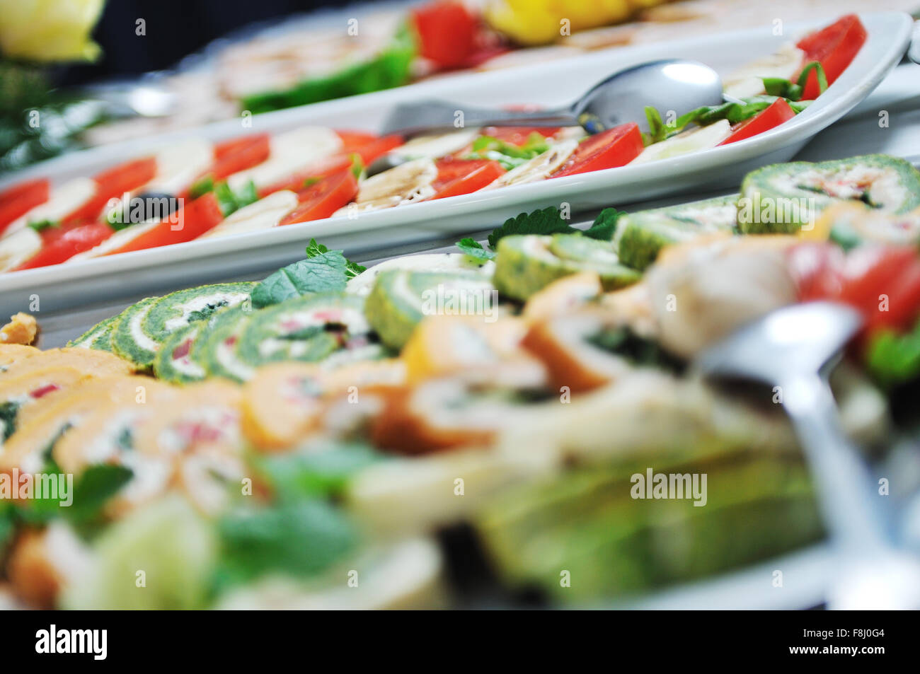 buffet catering food arangement on table Stock Photo - Alamy