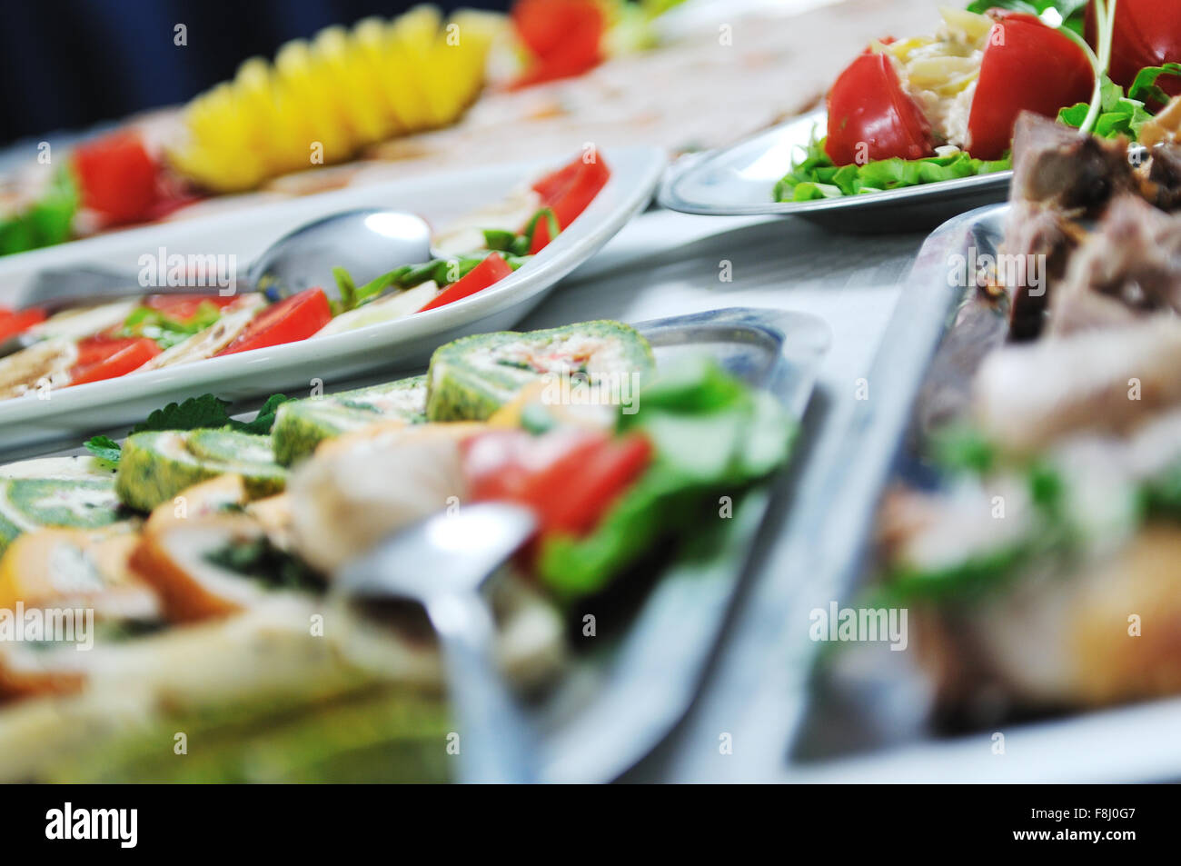 buffet catering food arangement on table Stock Photo - Alamy
