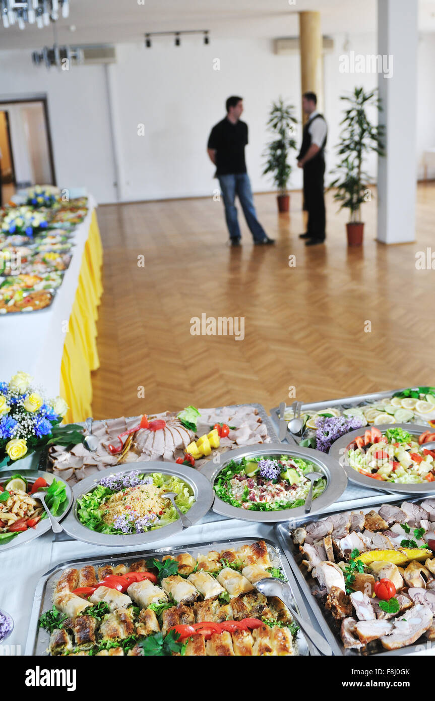 buffet catering food arangement on table Stock Photo - Alamy