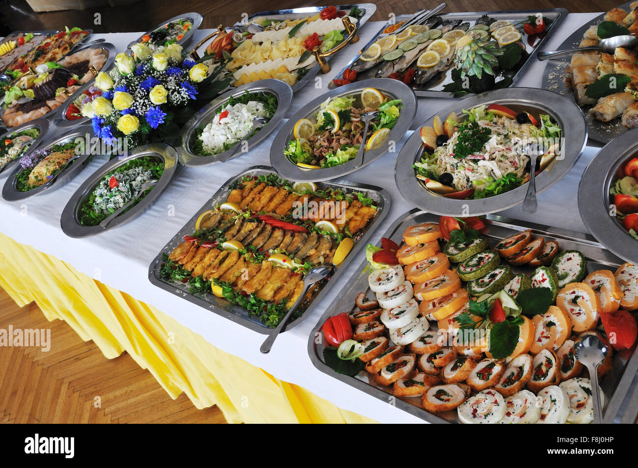 buffet catering food arangement on table Stock Photo - Alamy