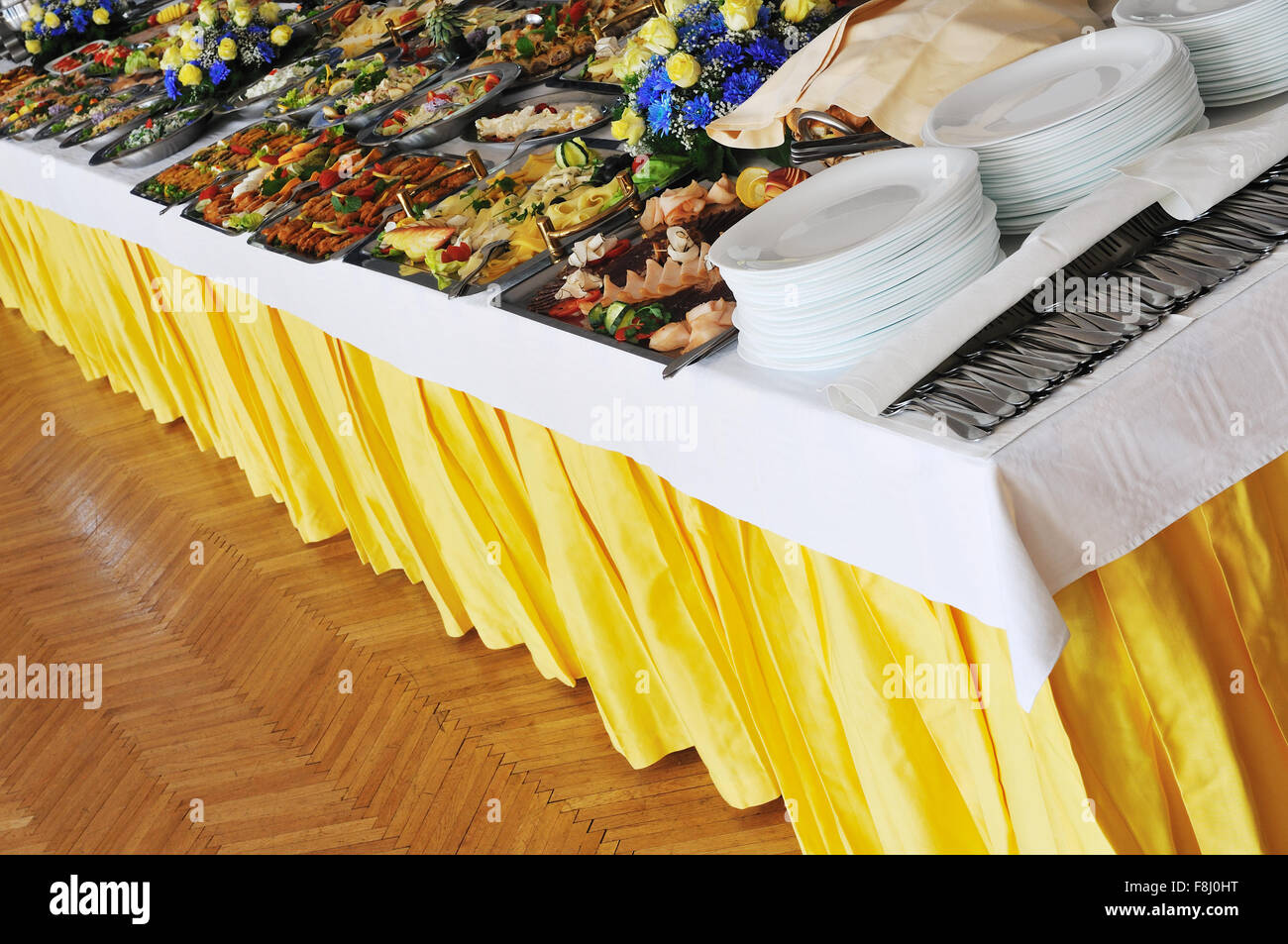 buffet catering food arangement on table Stock Photo - Alamy