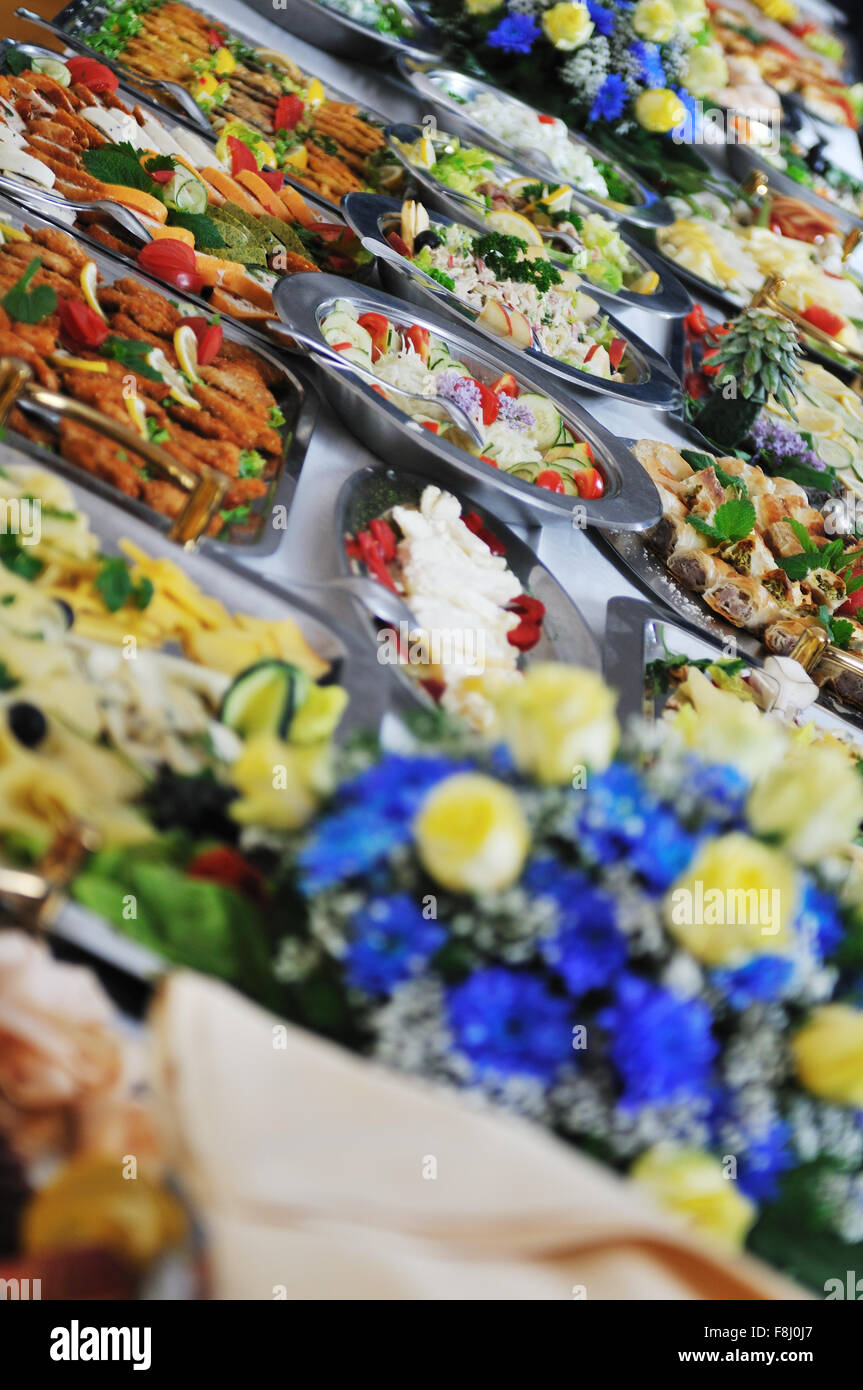 buffet catering food arangement on table Stock Photo - Alamy