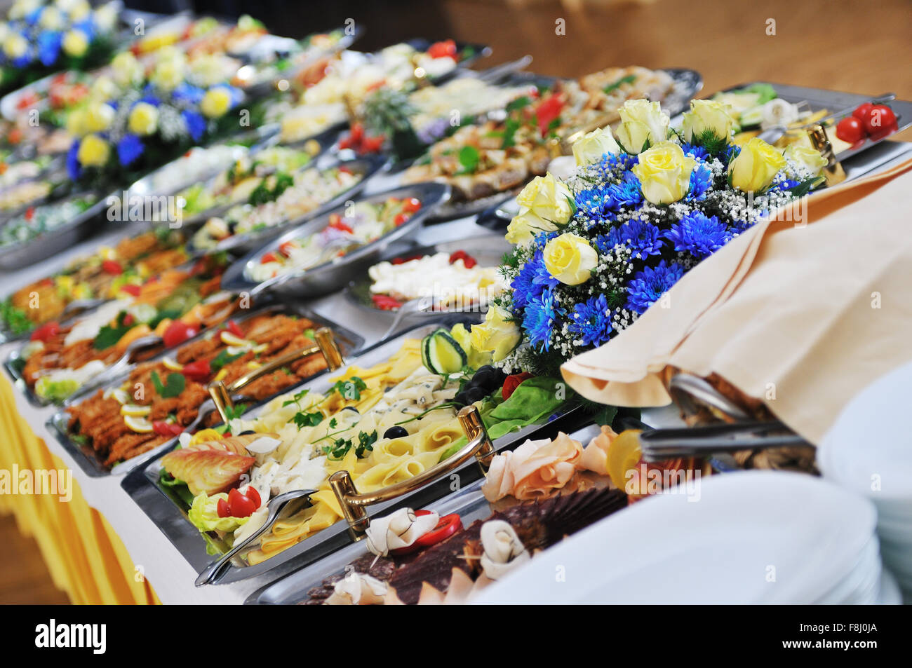 buffet catering food arangement on table Stock Photo - Alamy