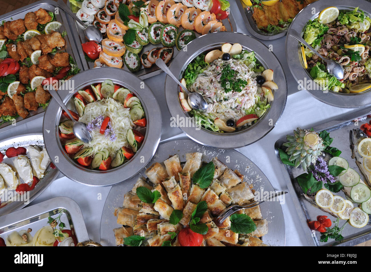 buffet catering food arangement on table Stock Photo - Alamy