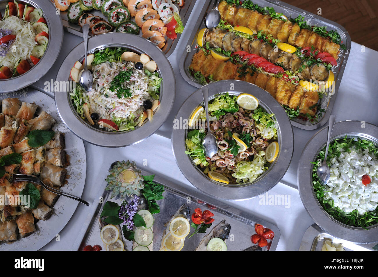 buffet catering food arangement on table Stock Photo - Alamy