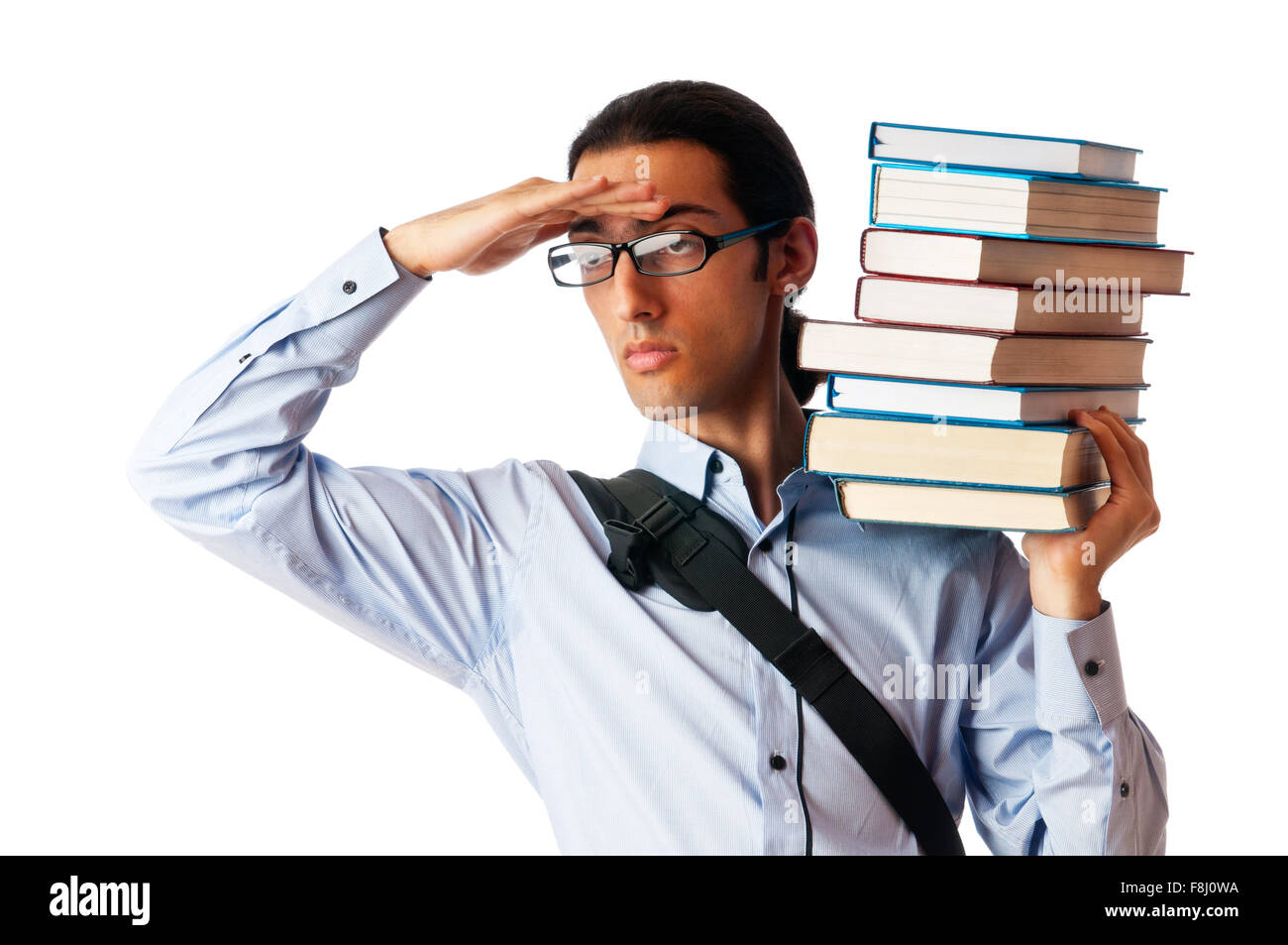 Student with stack of books on white Stock Photo - Alamy
