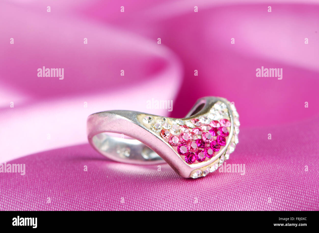 Fashion concept with ring on background Stock Photo - Alamy