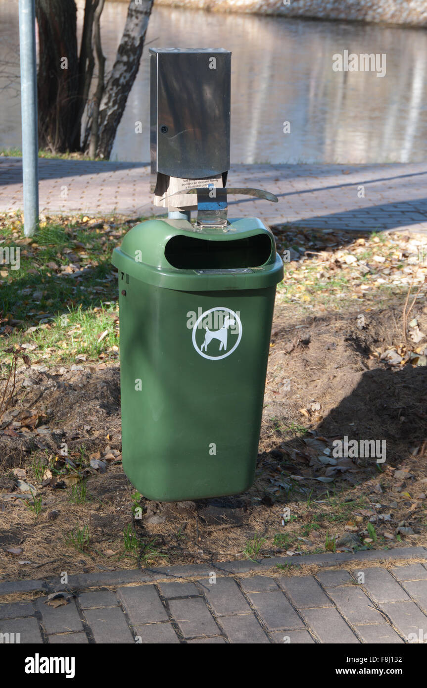 Litter basket for dog excrements with special packets Stock Photo - Alamy