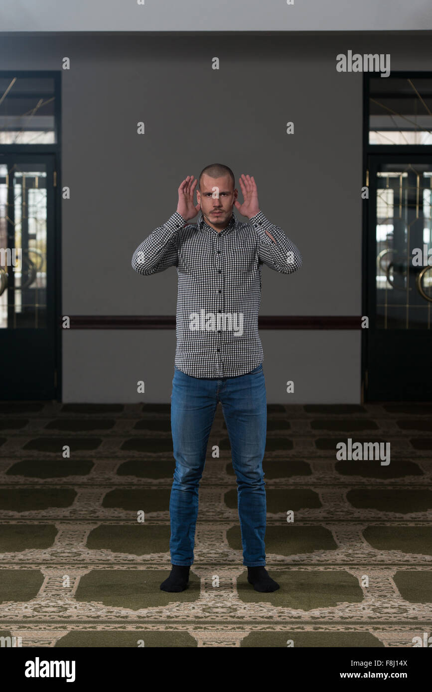 Young Muslim Man Making Traditional Prayer To God Allah Stock Photo - Alamy