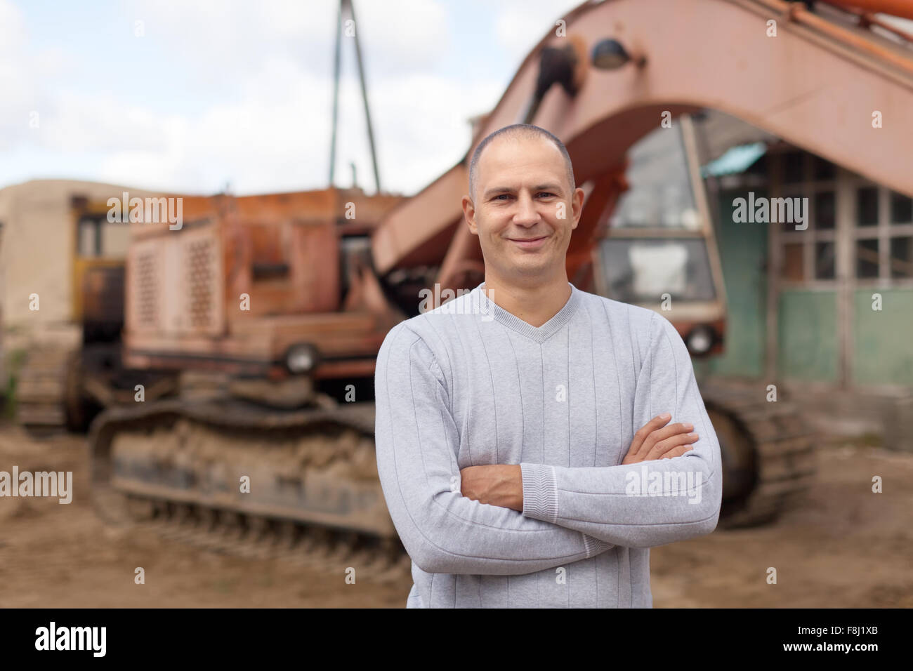 Portrait of tractor operator at workplace Stock Photo - Alamy