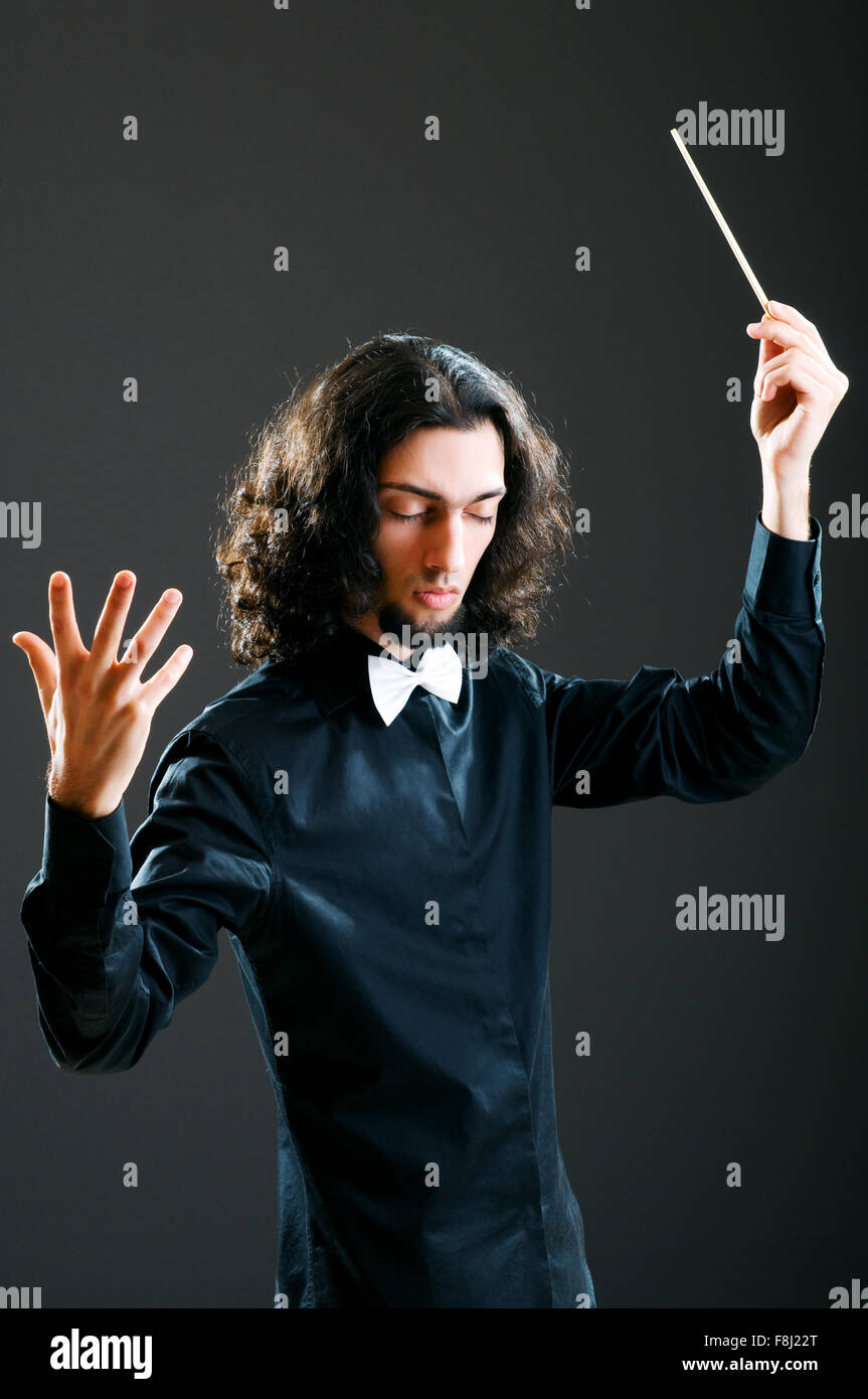 Music concept with passionate conductor Stock Photo - Alamy