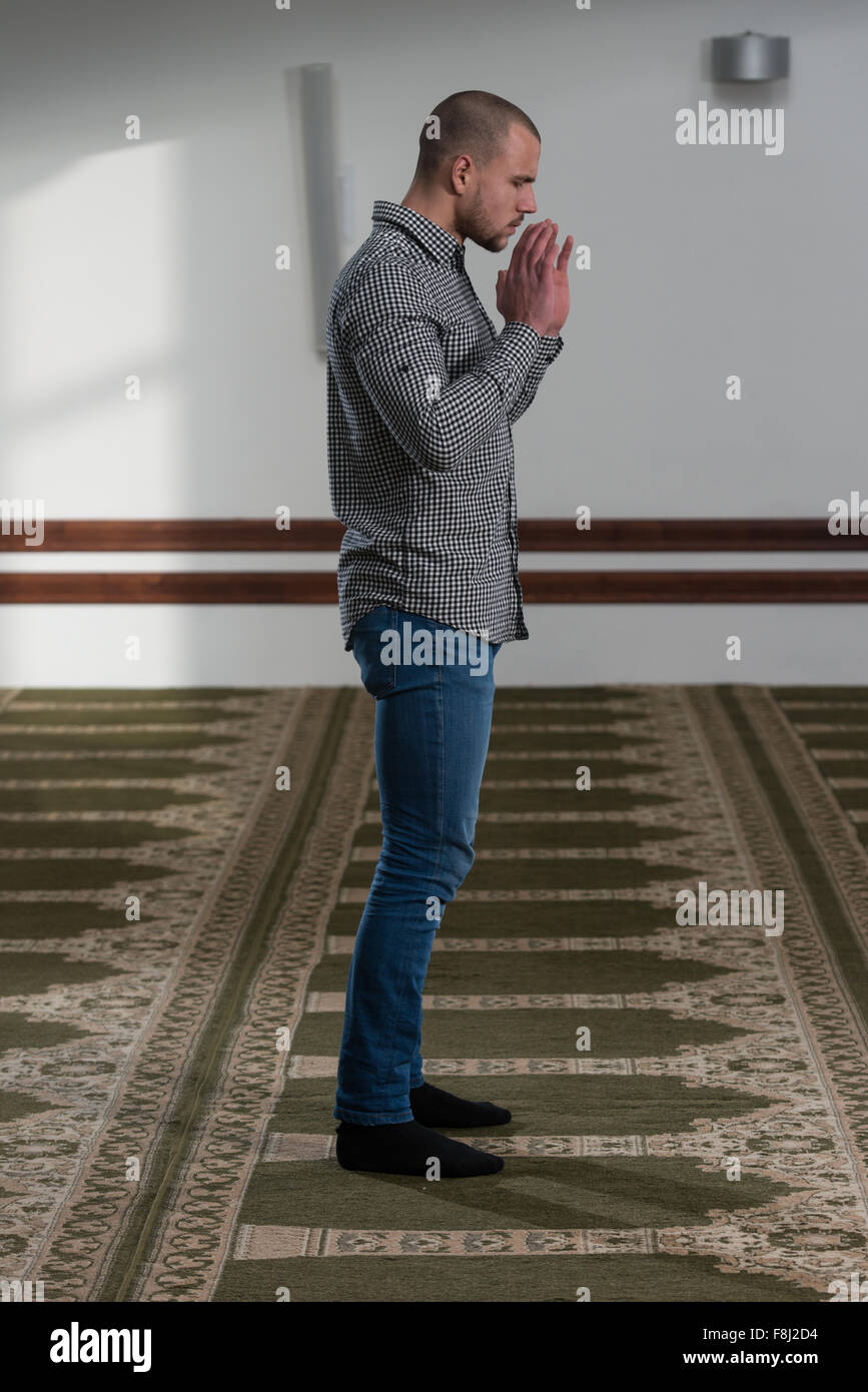 Young Muslim Man Making Traditional Prayer To God Allah Stock Photo - Alamy