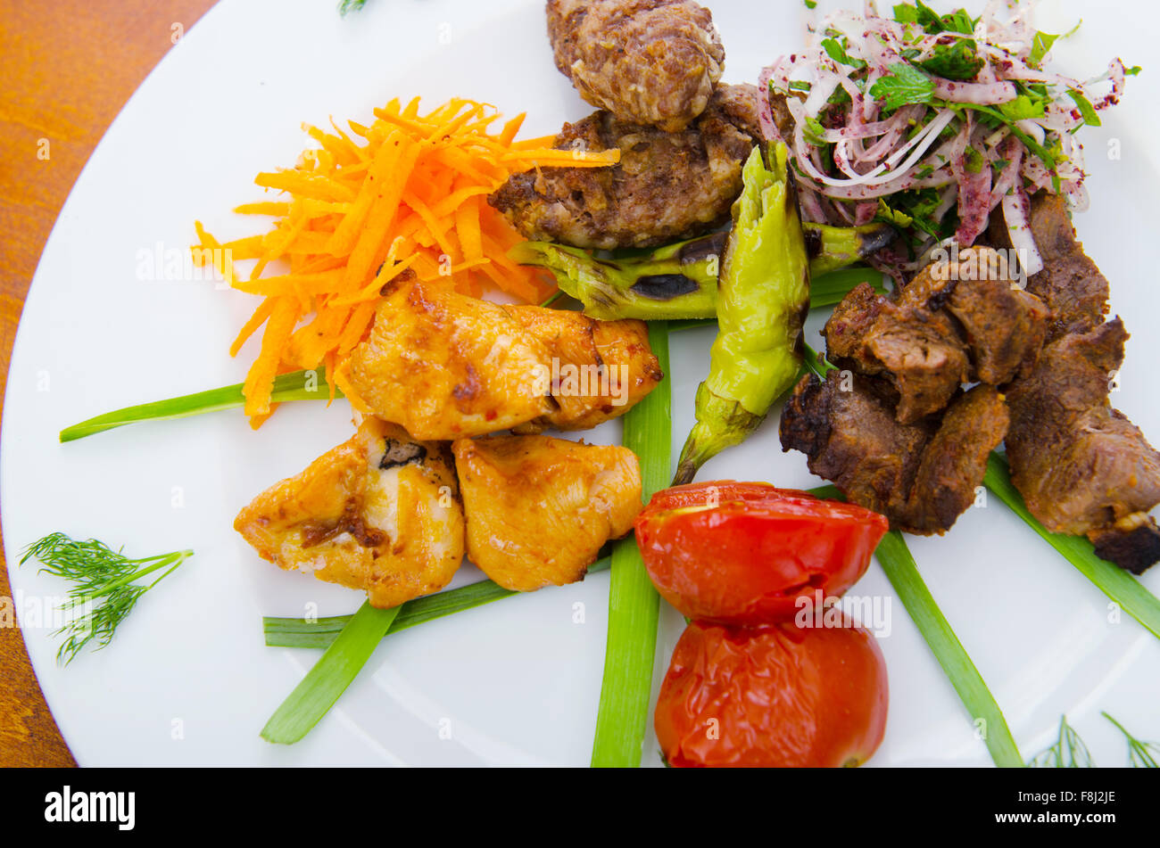 Plate with tasty lamp kebabs Stock Photo - Alamy