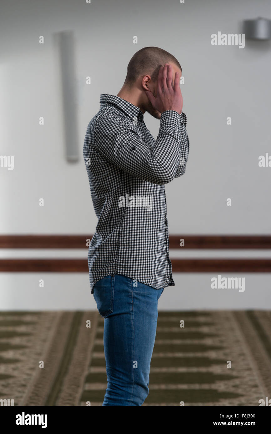 Young Muslim Man Making Traditional Prayer To God Allah Stock Photo - Alamy