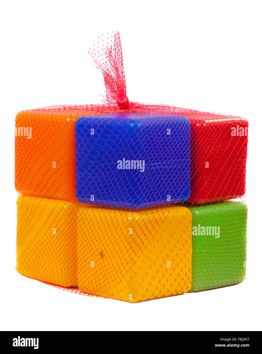 Packed plastic toy blocks on white background Stock Photo - Alamy