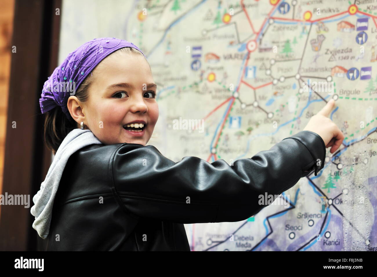 girl with city map navigation panel Stock Photo - Alamy