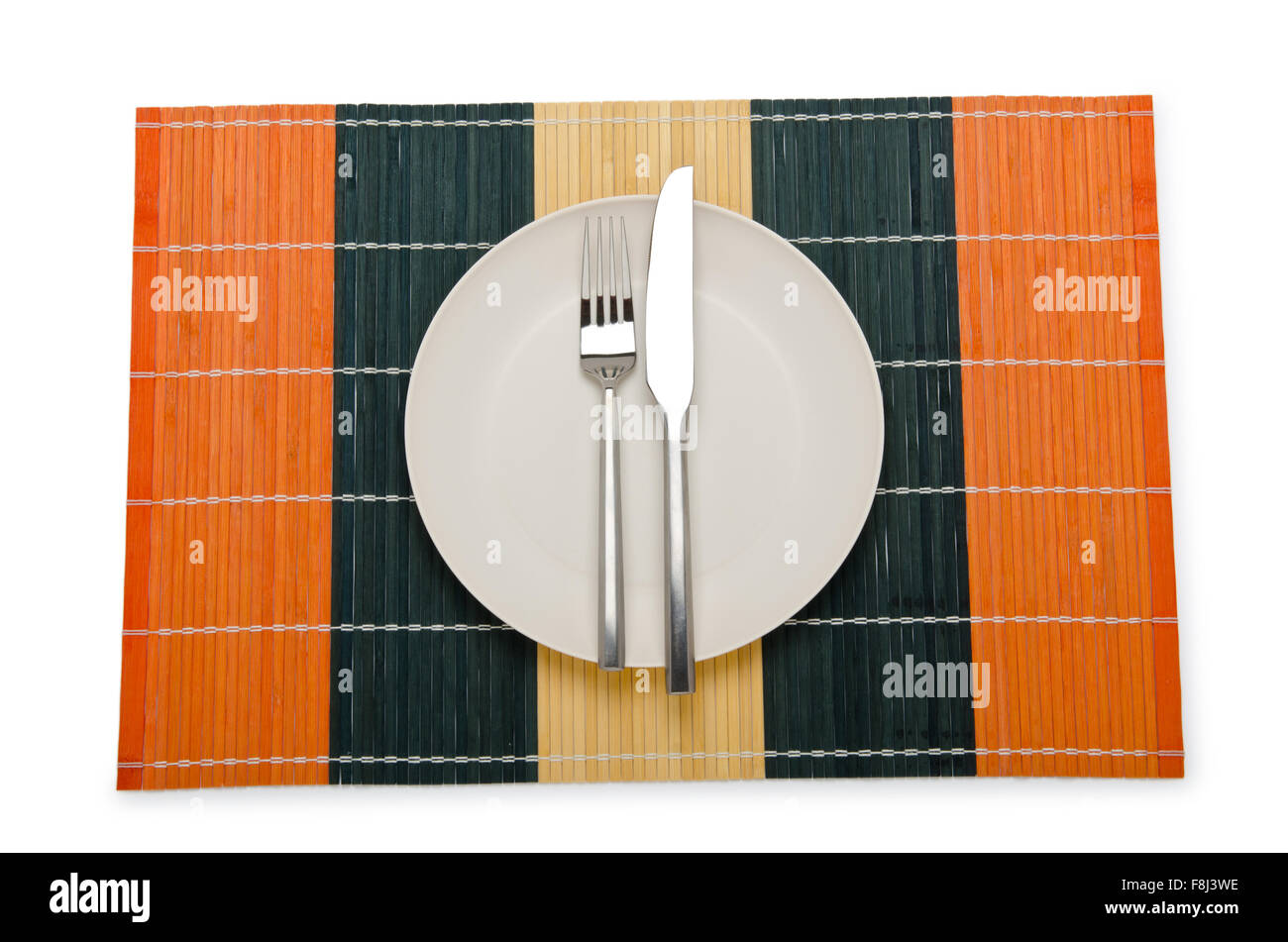 Plate and utensils served on table Stock Photo - Alamy