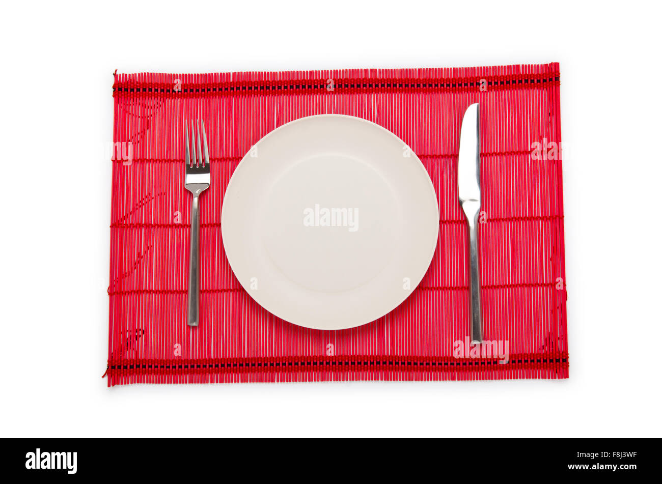 Plate and utensils served on table Stock Photo - Alamy