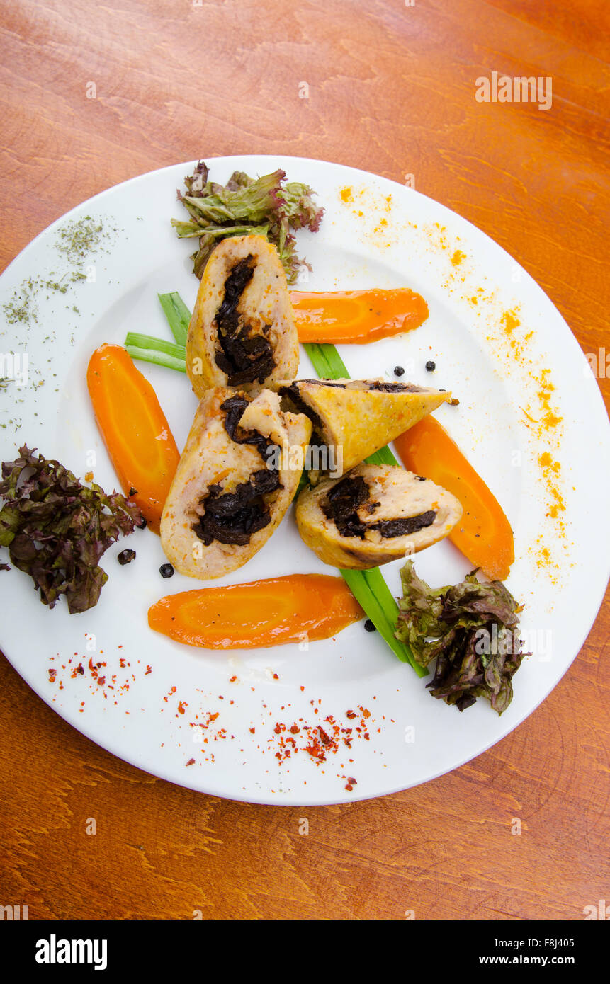 Meat and vegetable roll in plate Stock Photo - Alamy