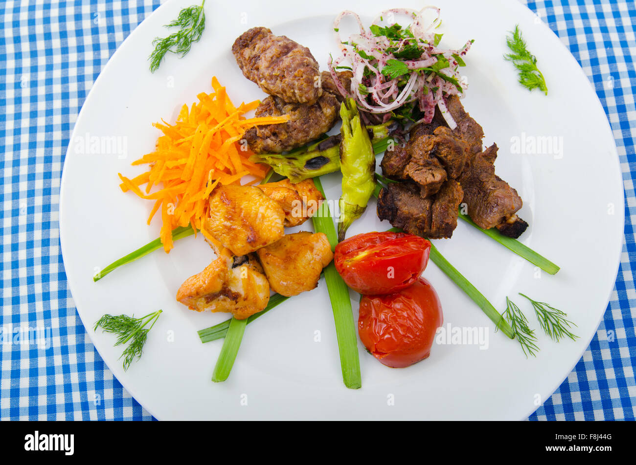 Plate with tasty lamp kebabs Stock Photo - Alamy