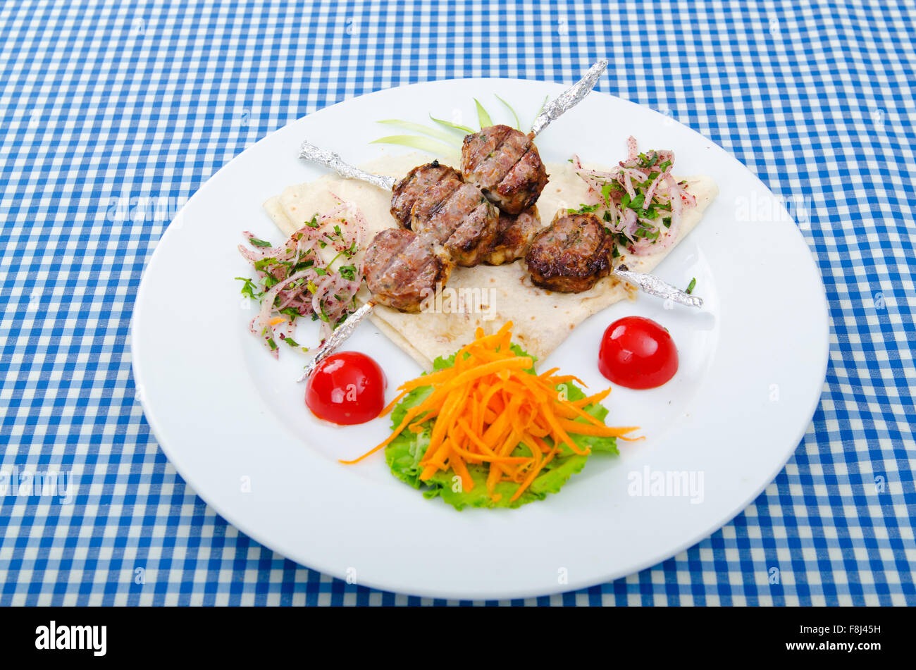 Meat cuisine - kebab served in plate Stock Photo - Alamy