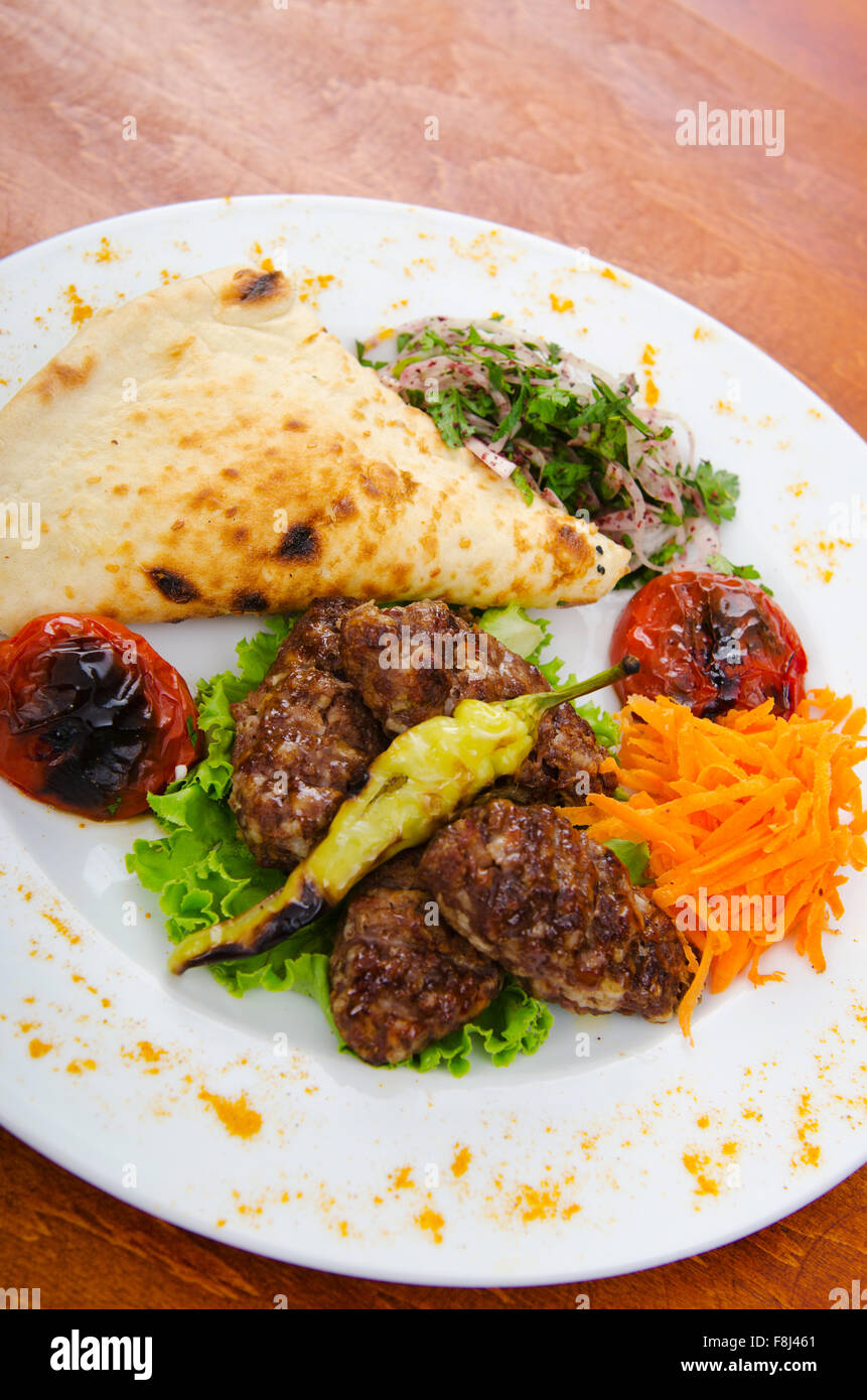 Meat cuisine - kebab served in plate Stock Photo - Alamy