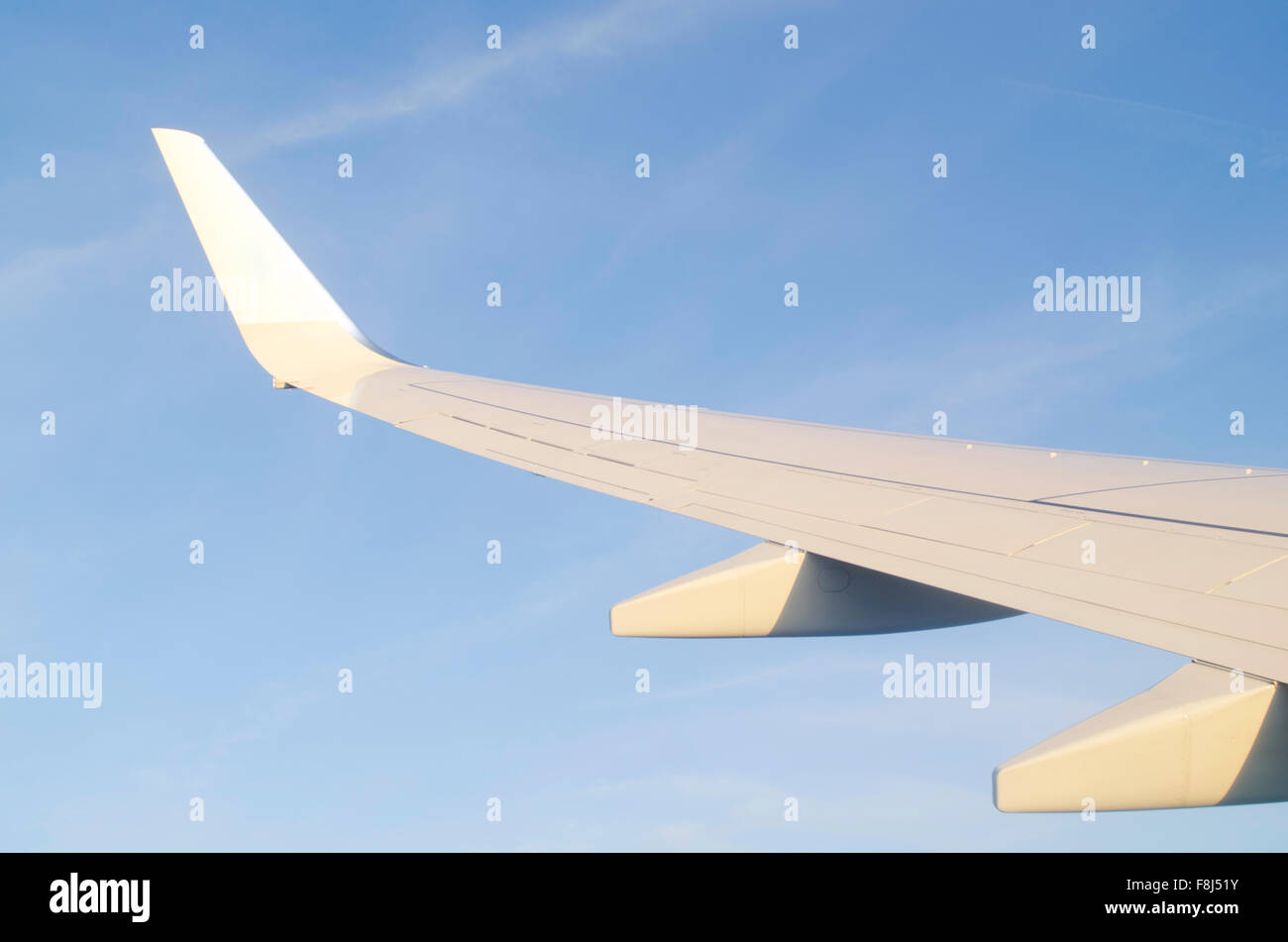 Wing of airplane from window Stock Photo - Alamy
