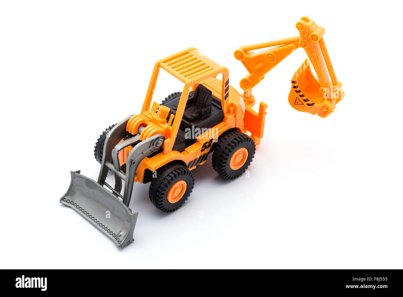 Orange tractor toy construction on white background Stock Photo - Alamy