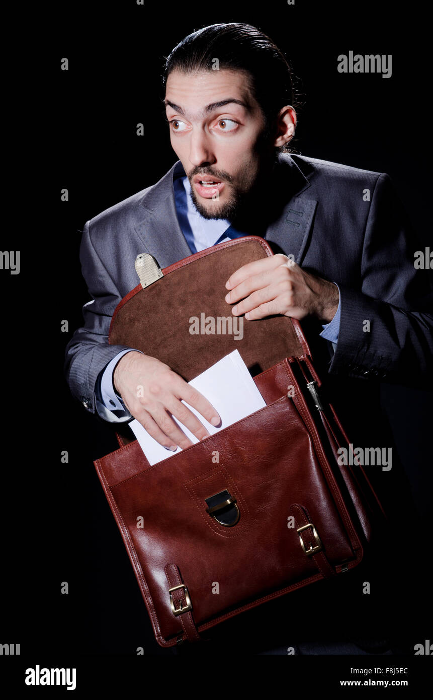 Business spy with briefcase Stock Photo - Alamy