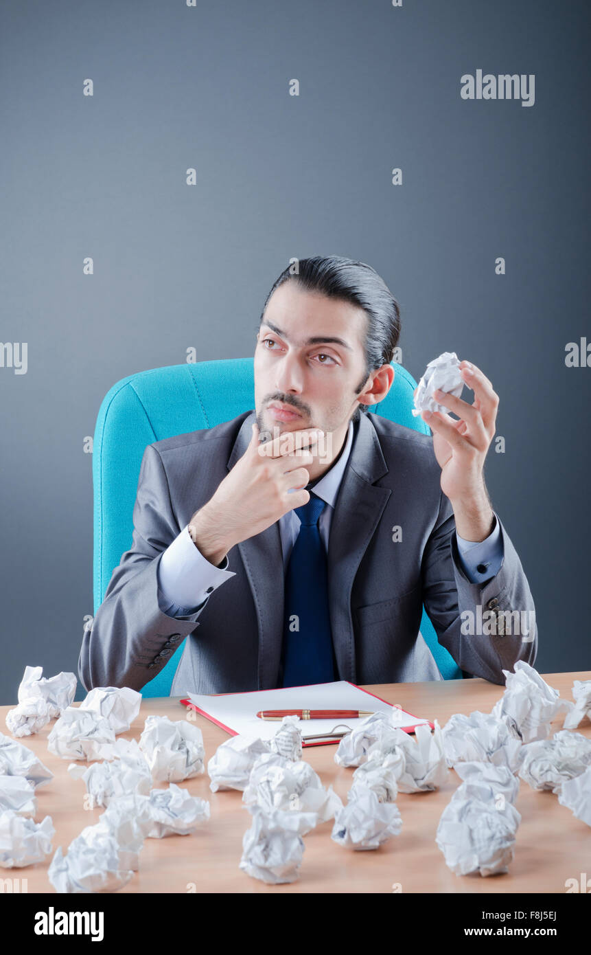 Businessman throwing paper away Stock Photo - Alamy