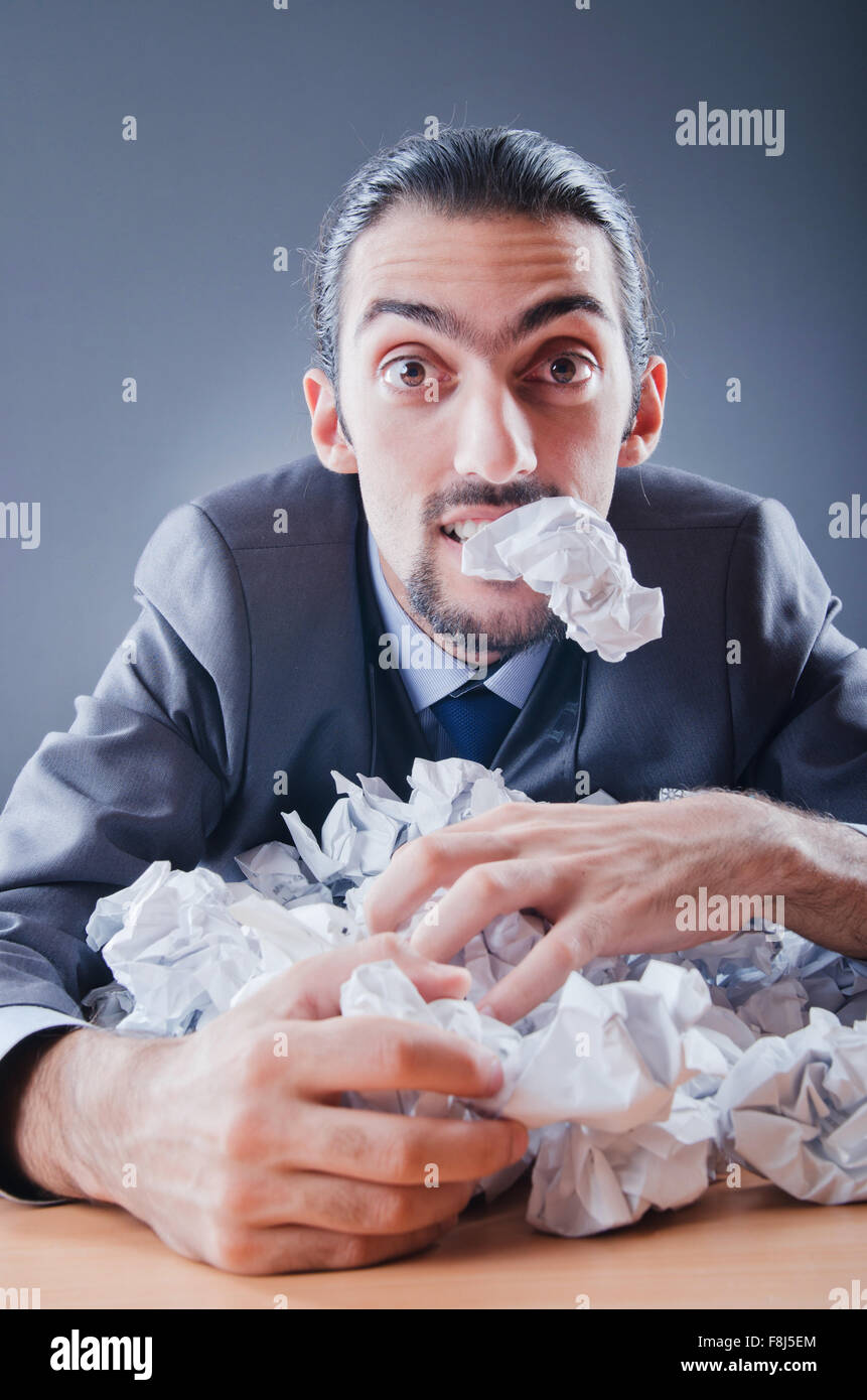 Businessman throwing paper away Stock Photo - Alamy