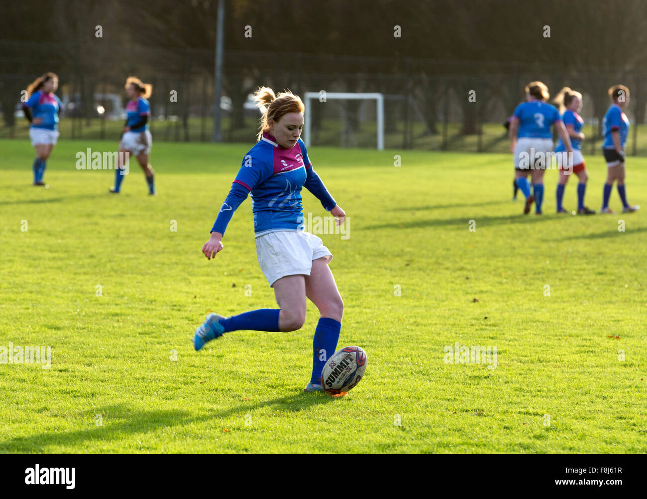 University sport UK - women`s Rugby Union, player kicking a conversion ...